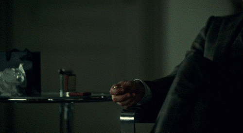 GIF coin toss mads mikkelsen hannibal - animated GIF on GIFER