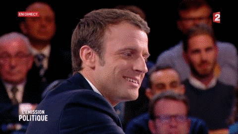 GIF emmanuel macron mimique sourire - animated GIF on GIFER