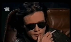 Andrew eldritch cigarette sisters of mercy GIF - Find on GIFER