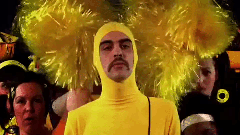 Yellow suit GIF - Conseguir o melhor gif em GIFER
